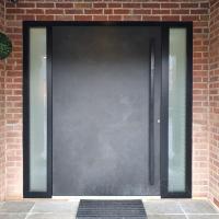 China Luxury Style Top Quality Black Color Bright Painting Side Glass Fixed Panel Front Pivot Door with Stainless Steel Handle for sale