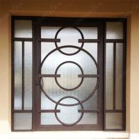 China Modern Screen Custom Arches Top Exterior Front Double Entry Iron Glass Door  Villa Front Entry Iron Pivot Door for sale