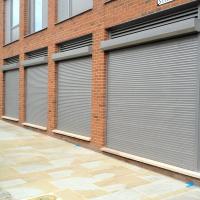 China 2025 Modern Automatic Industrial Sectional Pedestrian Door Good Price Bifold Garage Door Wholesale Electric Garage Door for sale