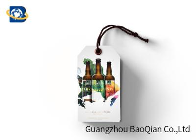 China Custom Logo Hang Tag Printing , PET / PP / Paper Custom Hang Tags With String for sale