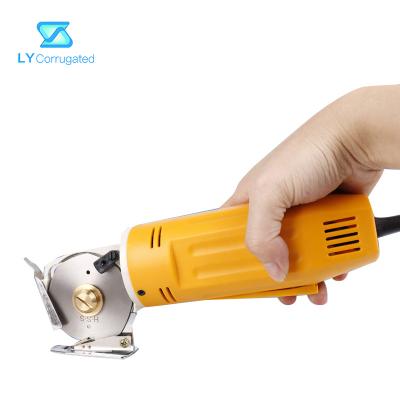 China Yellow 170W Electric Fabric Scissors Round Cutting Blade Portable Textile Machinery Parts for sale