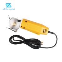 China Yellow 170W Electric Fabric Scissors Round Cutting Blade Portable Textile Machinery Parts for sale