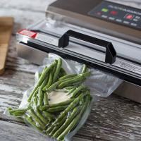 China Kitchen PA PE Embossed Vacuum Sealer Rolls Custom Logo Printing Vacuum Pouches for sale