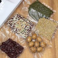 China Customized Size QS Embossed Vacuum Sealer Rolls BPA Free Food Vacuum Storage Bags for sale