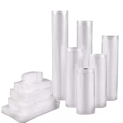 China Transparent Plastic Nylon Embossed Vacuum Sealer Bags Rolls For Kitchen Food Storage for sale