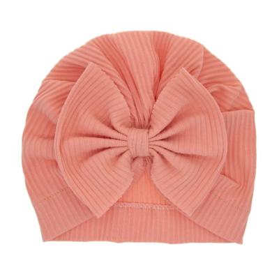 China Newborn Baby Hospital Hats with Bowknot 100% Cotton Infant Beanie Hat Custom Size for sale