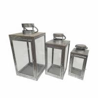 China Customizable Metal Lantern Featuring Clear Glass Panels and Top Vent for Heat Release Designed for Versatile Indoor and Outdoor for sale