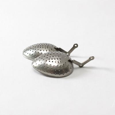 China 304 Grade Stainless Steel Teabag Rough Texture Steeping Tea Leaves in Hot Water for sale