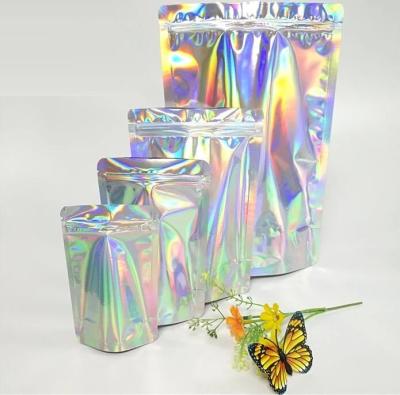 China Holographic Pouch Brightly Custom Printing Logo Laser Three Side Sealed Bag For Lip Eyelash Glue Hairpin for sale