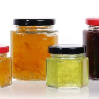 China High Quality Customized Hexagon Shape Glass Jar for Honey Jams Food Storage With Lid for sale