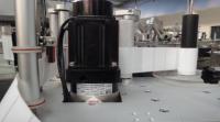 China Automatic Round Bucket Labeling Machine with Servo Wraparound Labeling and PLC Smart Error-Proof Control for sale
