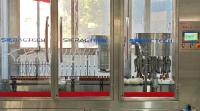 China Automatic Vial Health Beverage Capping Machine with 8-Head Rotary Press Capping and Continuous Motion Control for sale