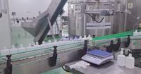 China Automatic Alcohol Gel Filling Machine with Servo Piston Dosing and Anti-Stringing Nozzle System for sale