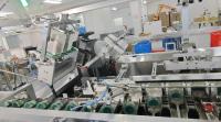 China Automatic Formaldehyde Cleaner Cartoning Machine with Anti-Jam Servo Loading for Heavy Bottle Packaging for sale