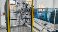 China Automatic Self-Heating Rice Case Packing Machine with Precision Robotic Handling and High-Speed Packaging for sale