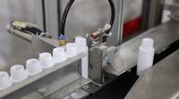 China Automatic Small Bottle Filling and Capping Monoblock Machine with 4-Head Servo Filling and 2-Head Torque Capping for sale