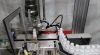 China Automatic Small Bottle Filling and Capping Monoblock Machine with 4-Head Servo Filling and 2-Head Torque Capping for sale