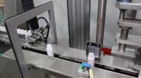 China Automatic Small Bottle Filling and Capping Monoblock Machine with 4-Head Servo Filling and 2-Head Torque Capping for sale
