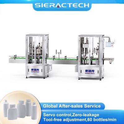 China Automatic Small Bottle Filling and Capping Monoblock Machine with 4-Head Servo Filling and 2-Head Torque Capping for sale