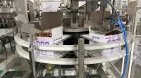 China Automatic Gummy Candy Sachet Vertical Cartoning Machine with Magazine Counting and Servo Transfer System for sale