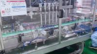 China Automatic Honey Filling Machine with Servo Piston Control and Heated Anti-Drip Filling System for sale