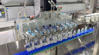 China Automatic Energy Drink Cap Placing Machine with Servo Cap Feeding and High-Speed Capping Automation System for sale