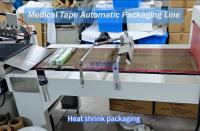 China Automatic Medical Tape Packaging Line (Cartoning & Shrink Wrapping System) for sale