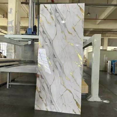 China Pvc Wpc Well Uv Wall Panel Marble Sheet Gold and White Large Effect PVC PANEL WALL Panels Pvc for sale