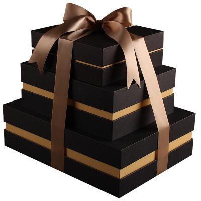 China Stackable Black Gold Rigid Gift Box with Custom Sizes and Gold Foil Trim for Luxury Packaging for sale