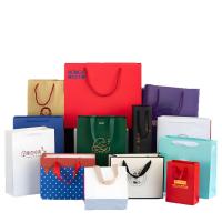 China Custom Kraft Paper Shopping Bags with Logo Printing - Eco-Friendly Cardboard Packaging in Custom Sizes for sale