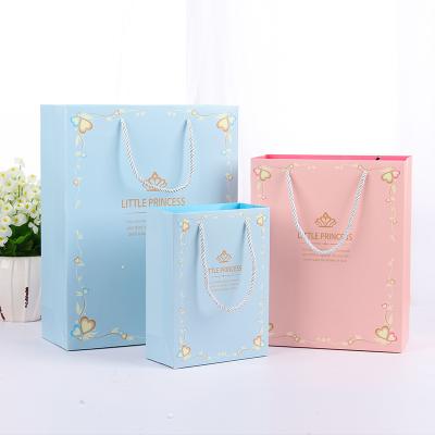 China Custom Printed Kraft Paper Tote Bags 15×7×20cm with Foil Stamping & UV Coating Options for Gift Packaging for sale