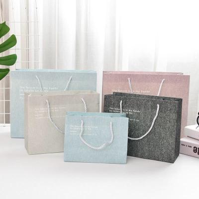 China Custom INS Style Paper Shopping Bags with Kraft Paper Material and Custom Size Options for Gift Packaging for sale