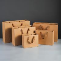 China Custom Kraft Paper Shopping Bags with Handles - Bulk Gift Packaging in Custom Sizes & Colors for sale