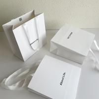 China White Cardboard Shopping Tote Bag 24x10x17cm with Custom Logo Printing for Clothing Stores and Gift Packaging for sale