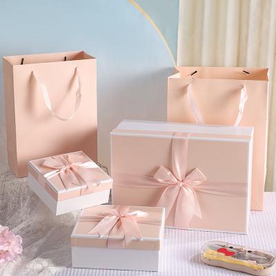 China Bowknot Gift Box 20x18x8cm with Custom Printing Options - Foil Stamping, UV Coating & Embossing Finishes for sale