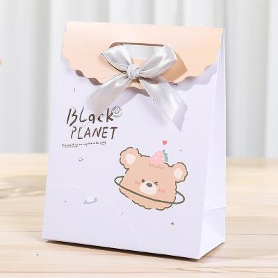 China Custom Flip Top Gift Bags 16.5cm 27cm 31.5cm Sizes with Cartoon Designs and Snap Closure for sale