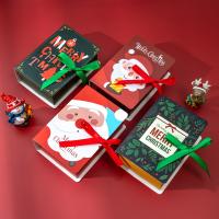 China Christmas Magic Book Gift Box Set Festive Storybook Candy Packaging Santa Reindeer Design Ribbon Tied Empty Boxes Custom Size for sale
