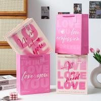 China Premium Textured Cardboard Gift Bags with Twisted Rope Handles - Custom Sizes & Colors Available for Romantic Packaging for sale