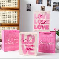 China Premium Textured Cardboard Gift Bags with Twisted Rope Handles - Custom Sizes & Colors Available for Romantic Packaging for sale