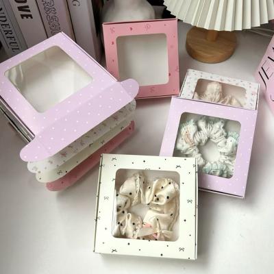 China Custom Cardboard Windowed Scrunchie Gift Boxes 5x5x4.3cm Aircraft Style for Hair Ties for sale