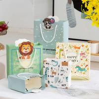 China Custom Printed Cartoon Paper Gift Bags with Rope Handles - 24×10×17cm & 35×13×26cm Sizes for Party Favors & Retail Packaging for sale