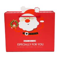China Custom Christmas Cartoon Paper Gift Bags 24x10x32cm Kraft Tote Bags for sale
