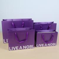 China Custom Thickened Kraft Paper Gift Bags 28x20x10cm Clothing Store Tote Bags with Logo for sale