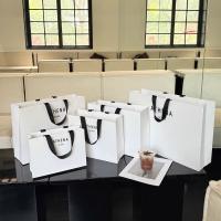 China Custom Logo Luxury Paper Shopping Bag 30x20x10cm Heavyweight Premium Carrier for Fashion Boutique Retail for sale