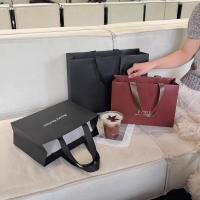 China Custom Logo Luxury Paper Shopping Bag 30x20x10cm Heavyweight Premium Carrier for Fashion Boutique Retail for sale
