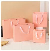China Custom Kraft Paper Shopping Bags Wholesale 16x8x17cm Gift Tote Bags with Offset Printing for sale
