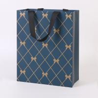 China Custom Kraft Paper Bags 25x12x32cm for Garment Cosmetic Gift Packaging for sale