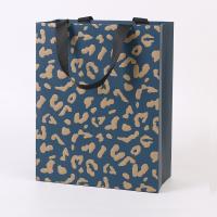 China Custom Kraft Paper Bags 25x12x32cm for Garment Cosmetic Gift Packaging for sale
