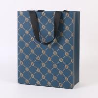 China Custom Kraft Paper Bags 25x12x32cm for Garment Cosmetic Gift Packaging for sale