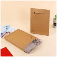 China Custom Kraft Paper Bags with Logo 26x26x3cm for T-Shirt Packaging and Document Storage for sale